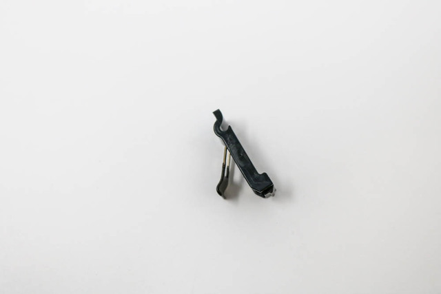 77360-0R010 - Fuel Door Spring Longo Toyota Parts